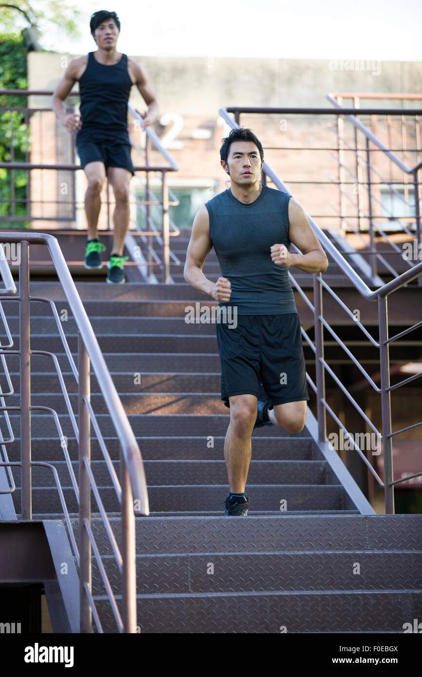 Running down steps hi-res stock photography and images - Alamy