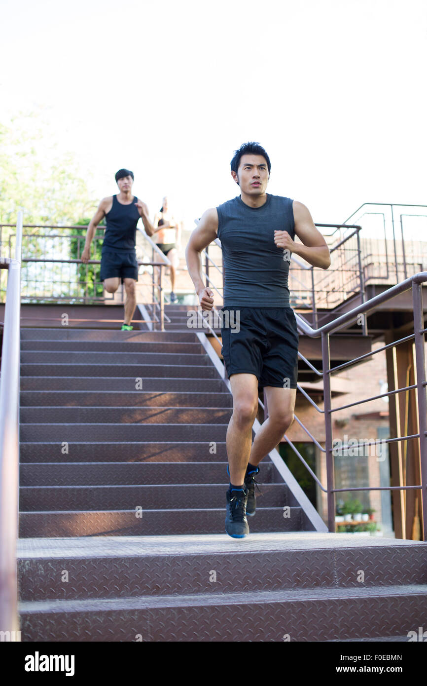 Running down steps hi-res stock photography and images - Alamy