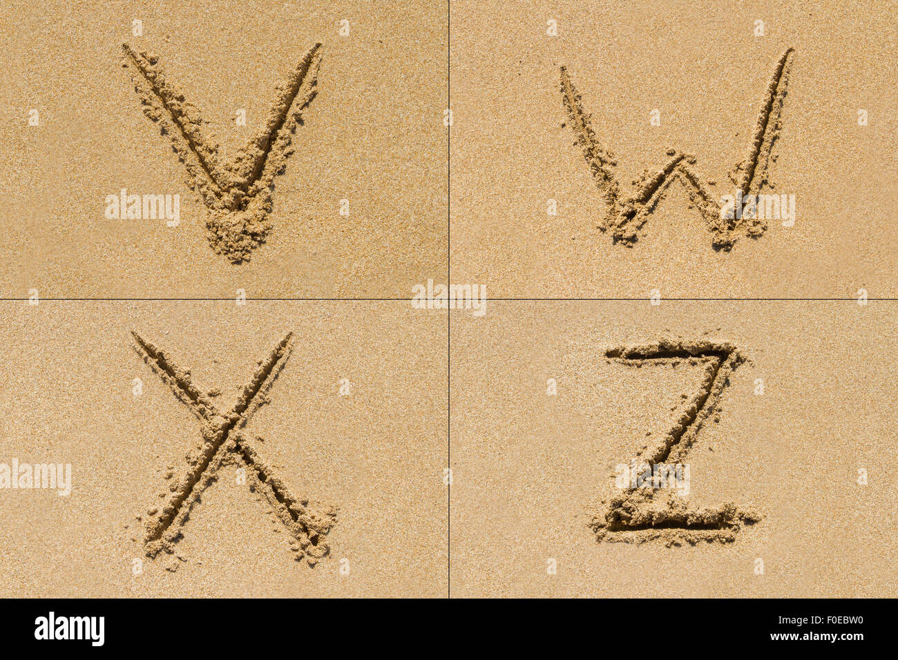 Conceptual set of V W X Z letter of the alphabet written on sand with ...