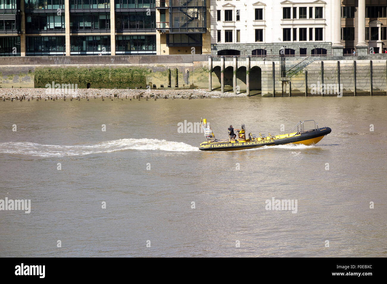 A speed boat travels along the River Thames in London Stock Photo - Alamy