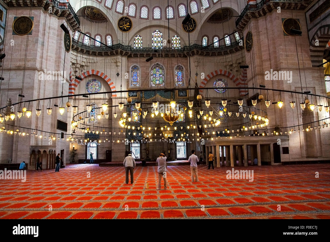 Muslim men praying at mosque. Mosque is "Suleymaniye Mosque" Istanbul ...