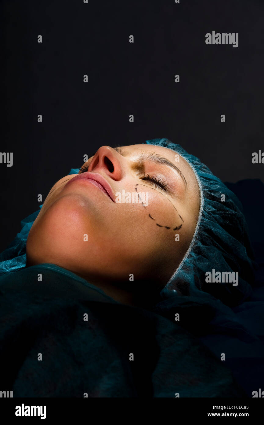 Woman undergoing plastic surgery Stock Photo - Alamy