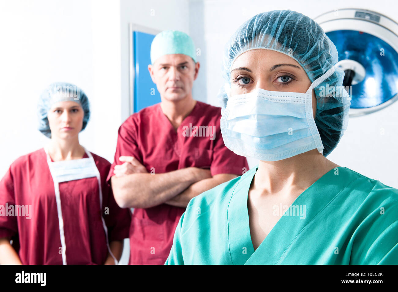 Portrait of a medical team inside operating room Stock Photo - Alamy