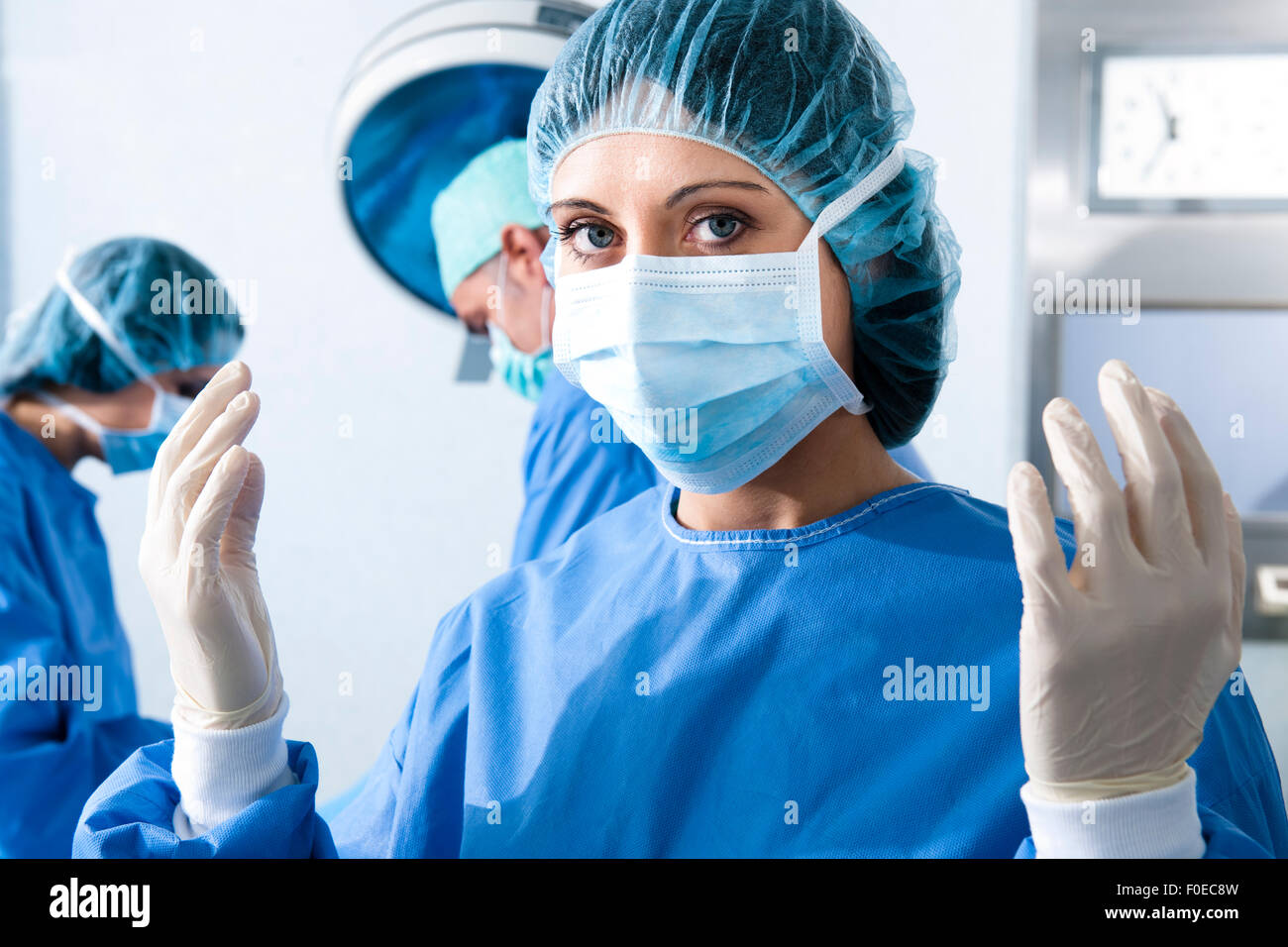 Portrait of a female surgeon, operation in the background Stock Photo ...