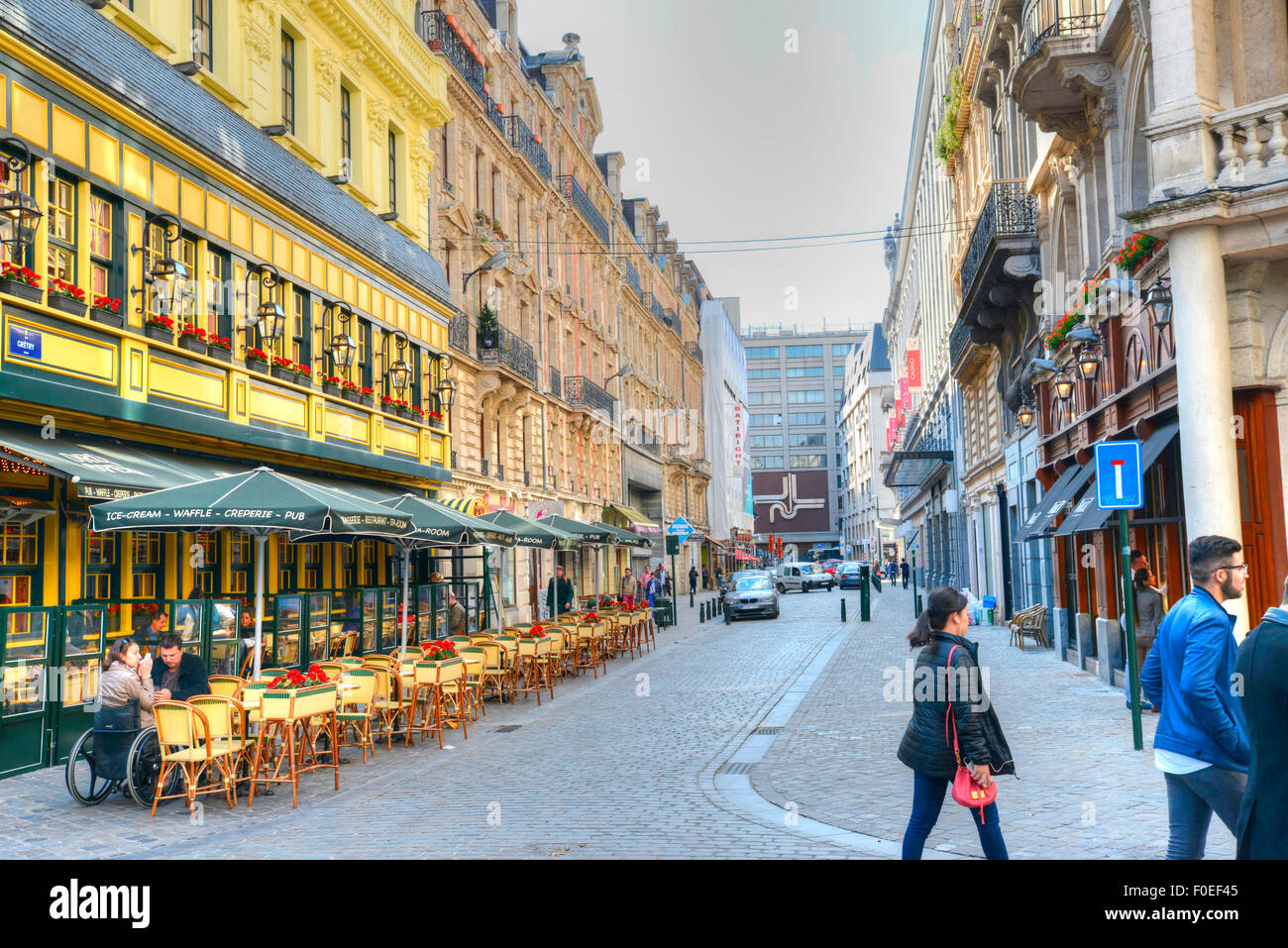 Street in the center of Brussels with shops and restaurants Stock Photo ...