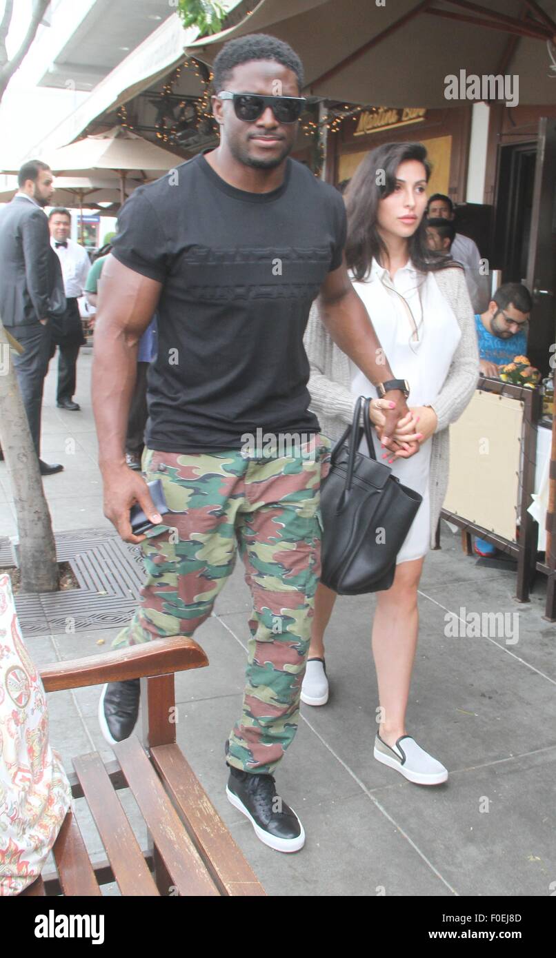 Reggie Bush and his pregnant wife Lilit Avagyan go for lunch at Il ...