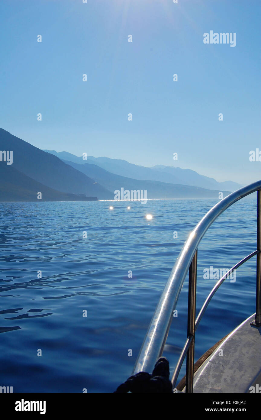 front of a boat sailing the Libyan sea on the southern coast of Crete ...