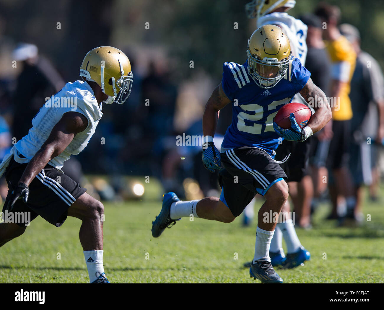 San Bernardino, CA. 10th Aug, 2015. UCLA running back (22) Roosevelt ...