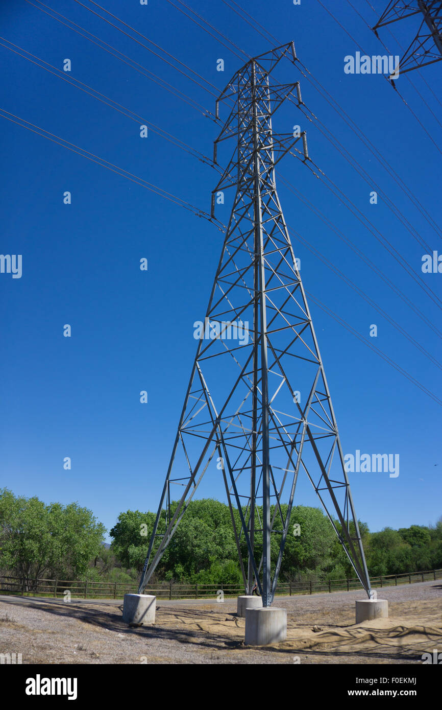 Tall metal power line tower above a walking path in Santa Clarita ...