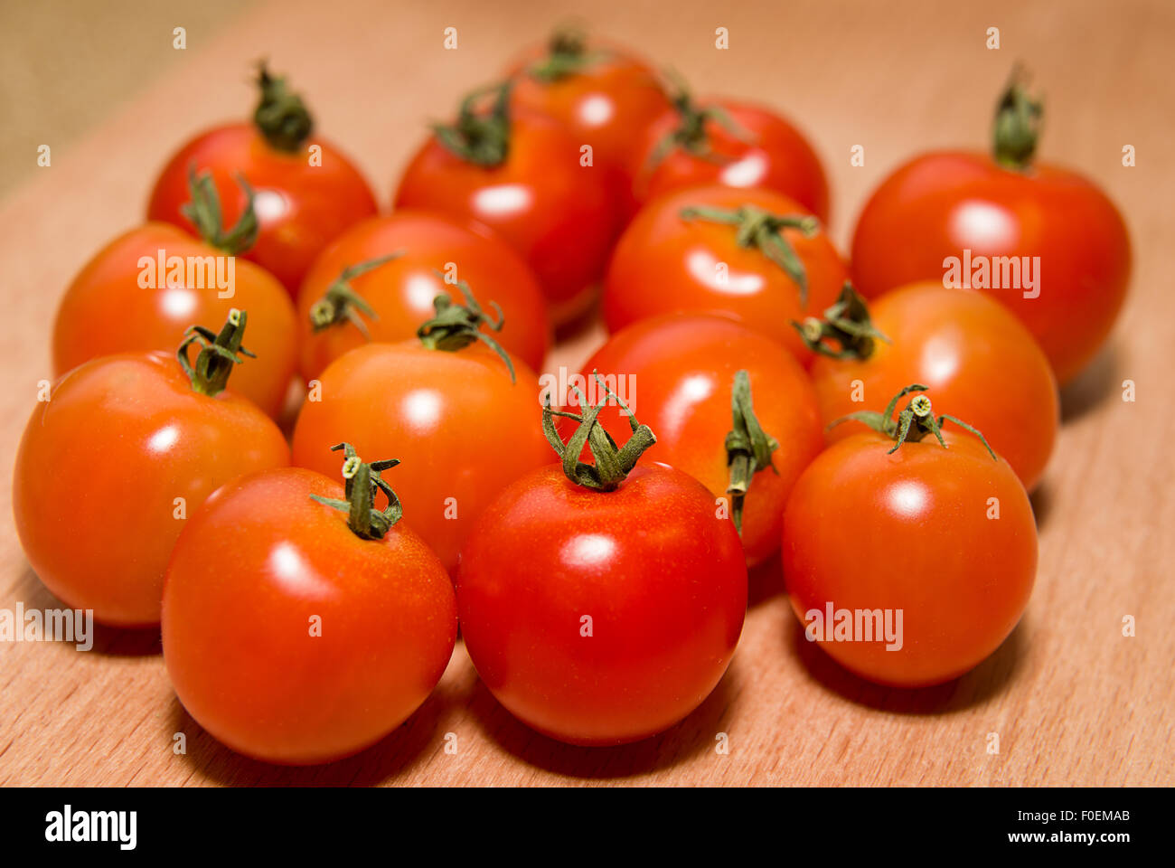 Ripe tomatoes on wooden hi-res stock photography and images - Alamy