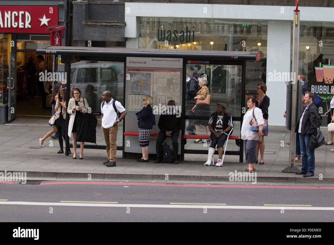 Bus queue hi-res stock photography and images - Alamy