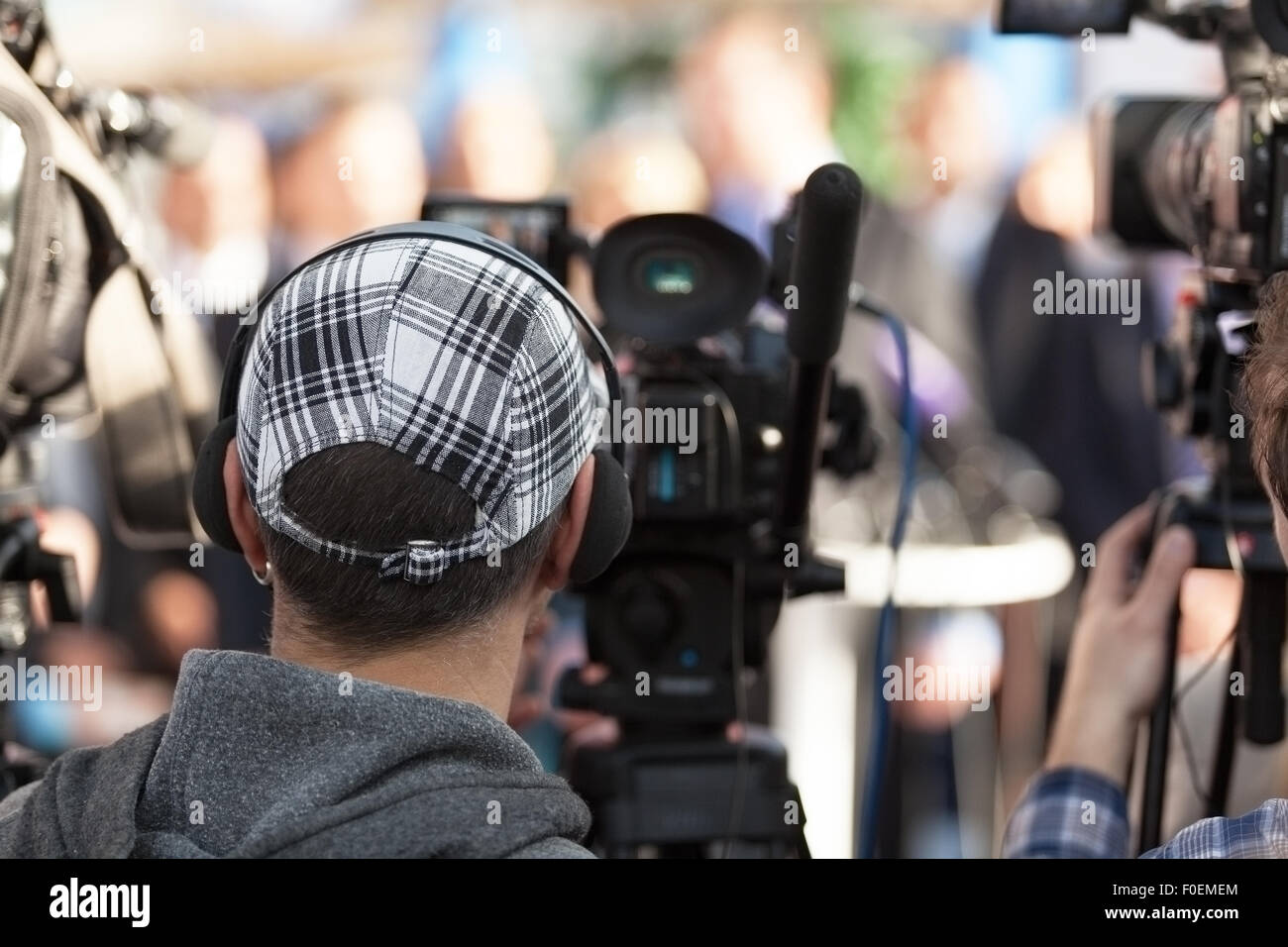 filming an event with a video camera Stock Photo - Alamy
