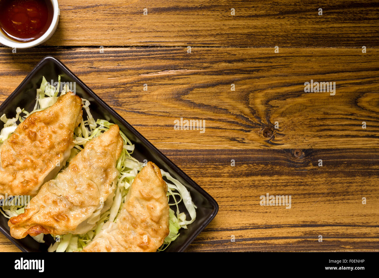 Gyoza, traditional pork dumpling, eaten with soy sauce popular in Japan ...
