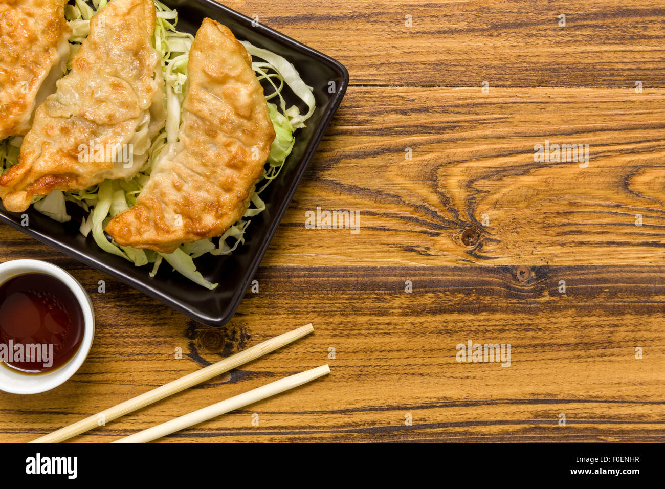 Gyoza, traditional pork dumpling, eaten with soy sauce popular in Japan ...