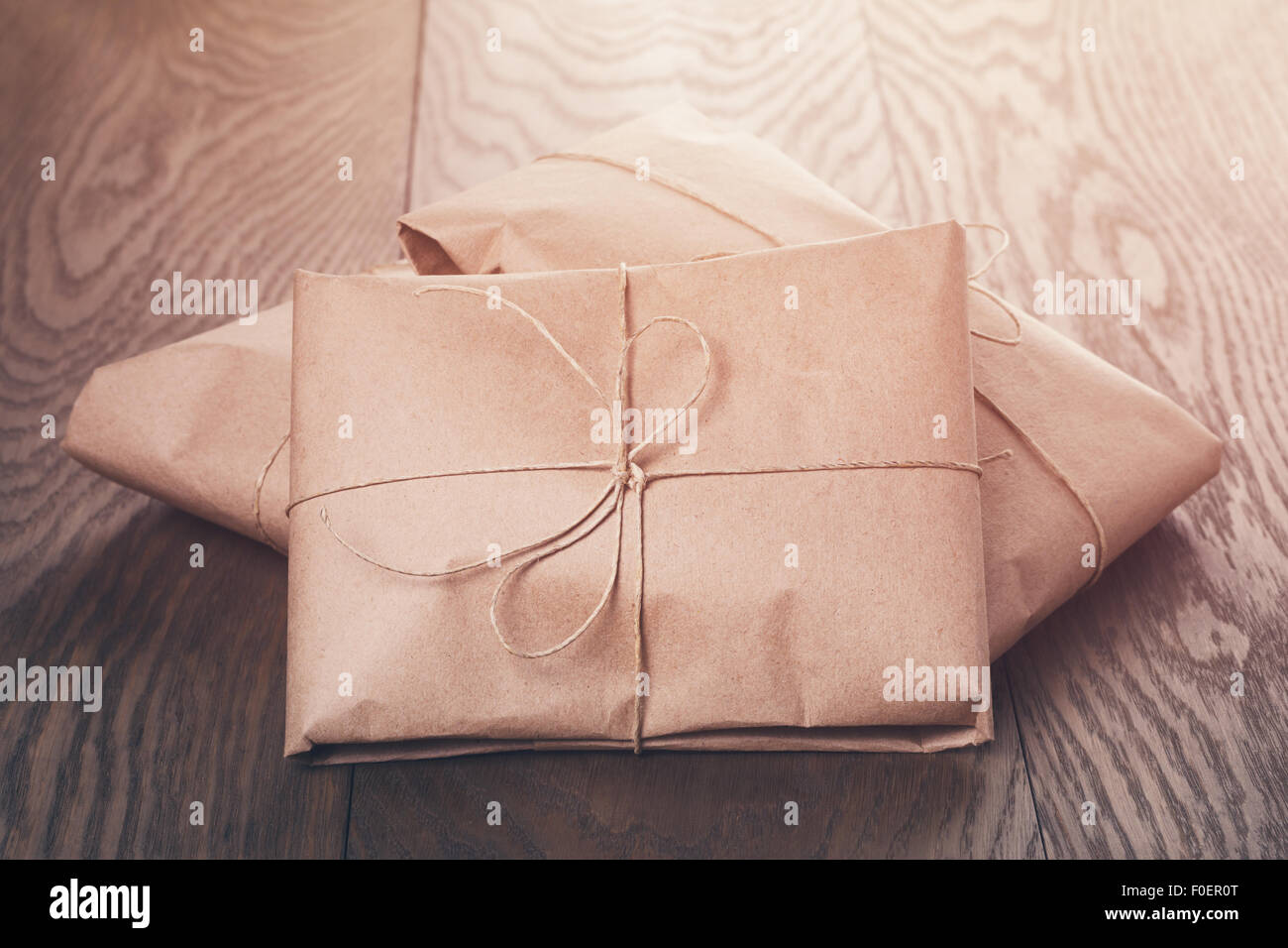 vintage style parcels wrapped with rope Stock Photo - Alamy