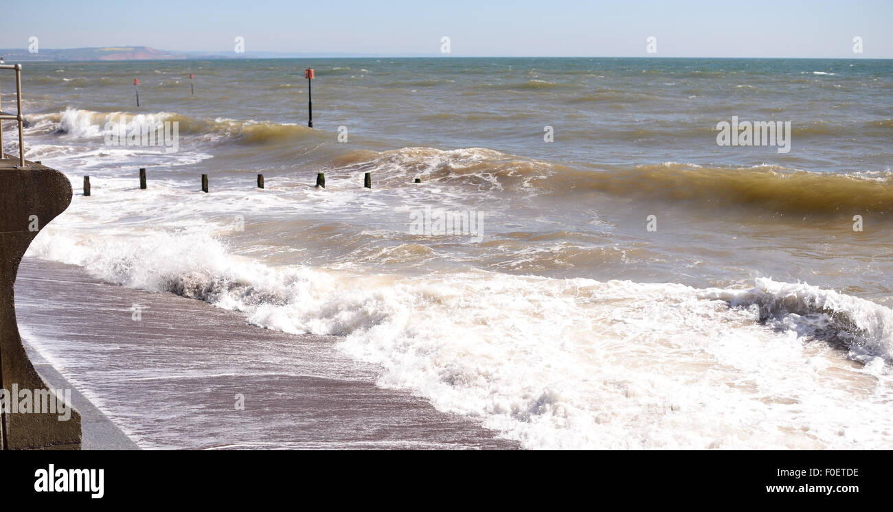 Incoming waves along the sea wall Stock Photo - Alamy