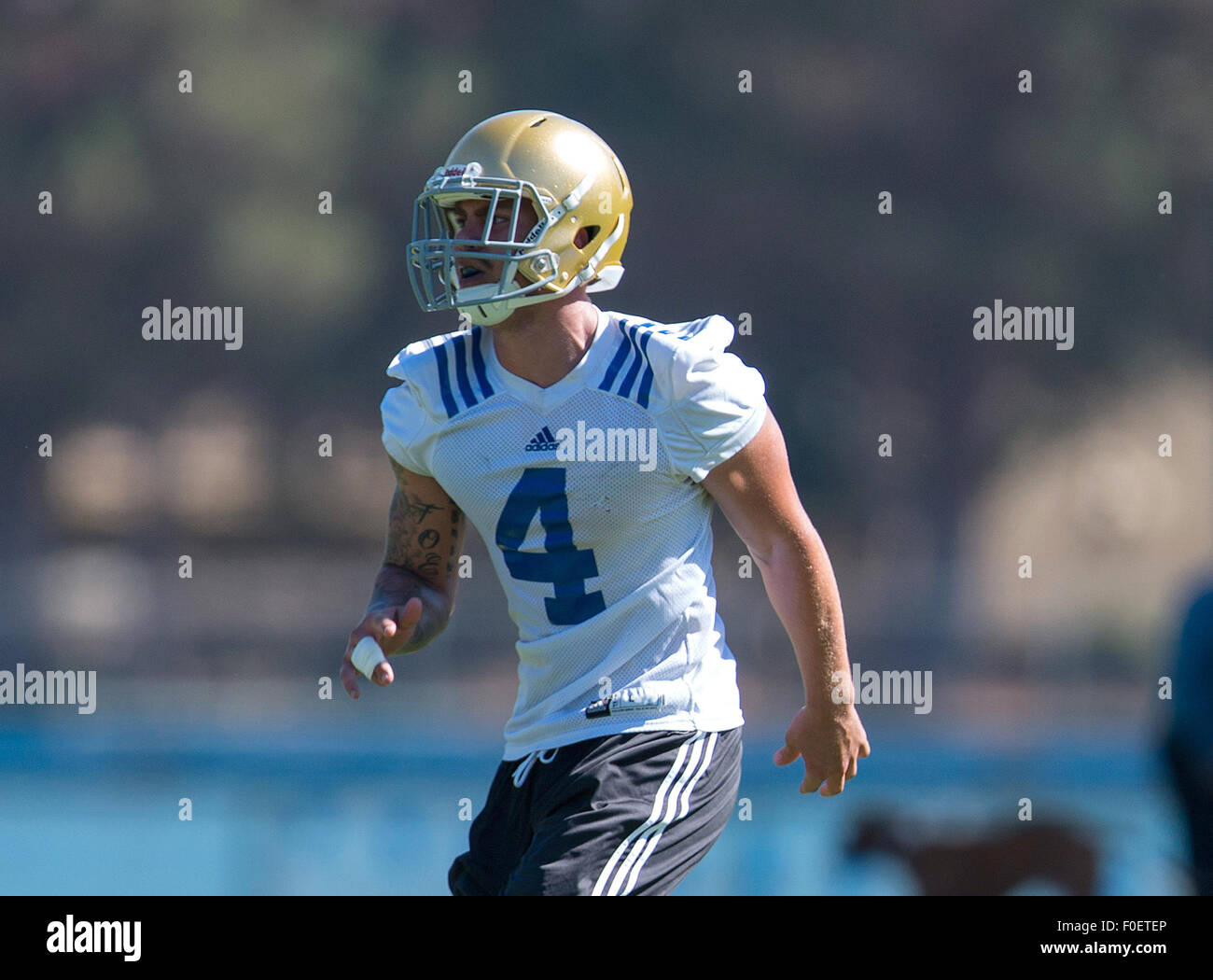 San Bernardino, CA. 10th Aug, 2015. UCLA linebacker (4) Cameron Judge ...