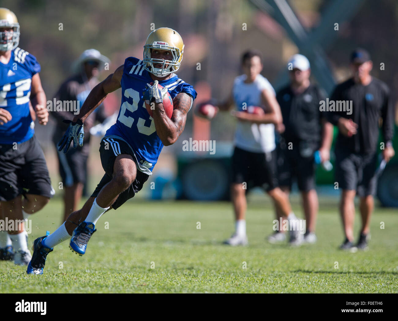 San Bernardino, CA. 10th Aug, 2015. UCLA running back (23) Nate Starks ...