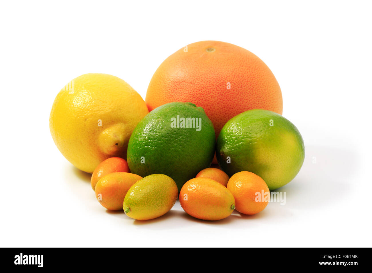 Some citrus fruits isolated on a white background Stock Photo - Alamy