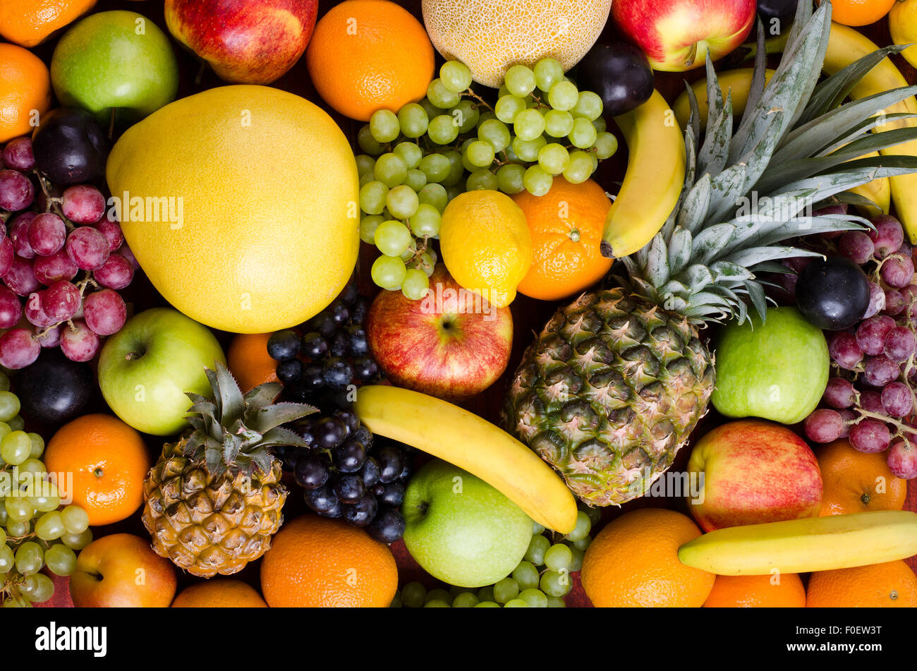 still life of big heap multi-coloured fruits, background Stock Photo ...