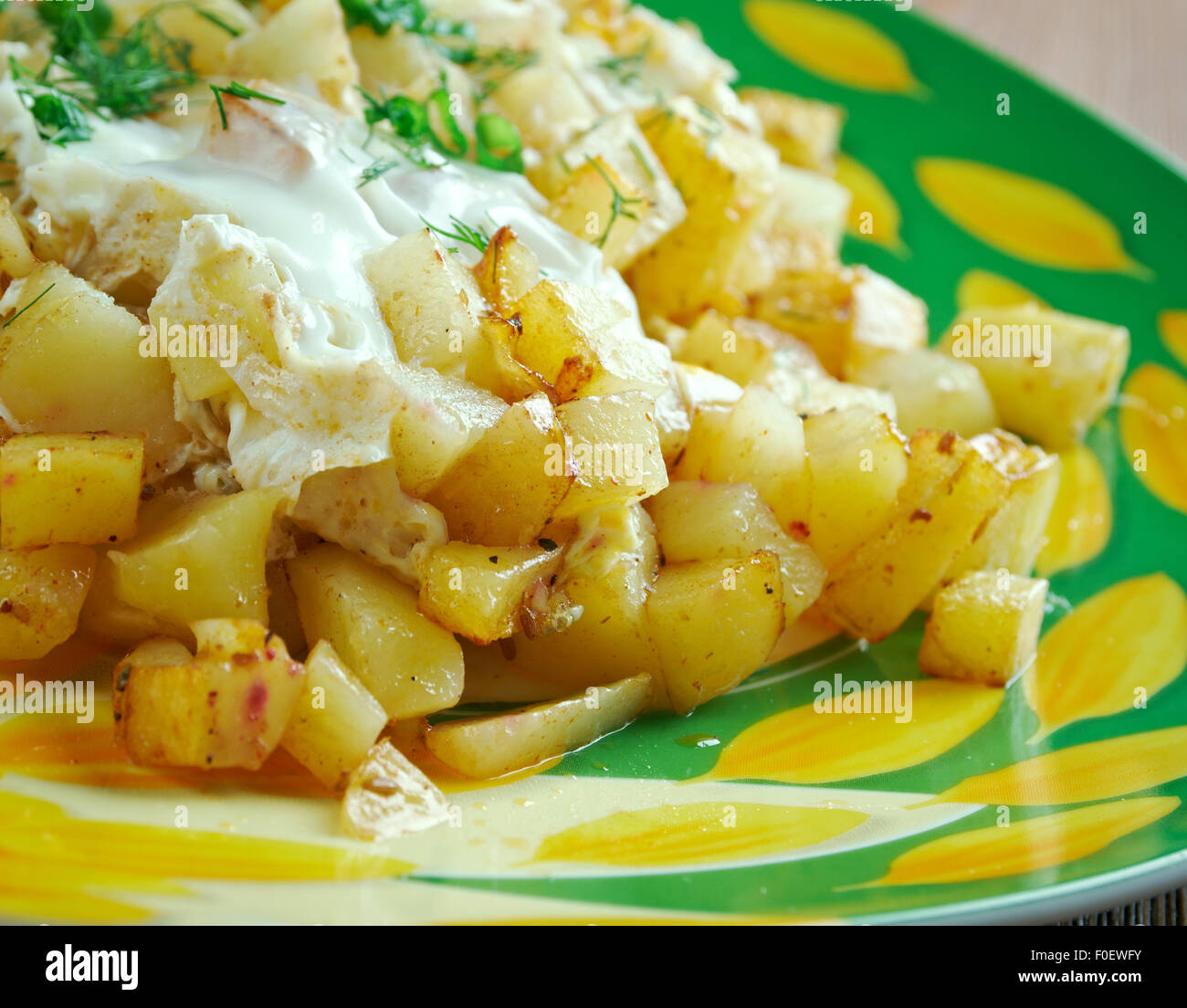 Patatesli yumurta - fried potatoes with eggs and spices.Turkish cuisine ...