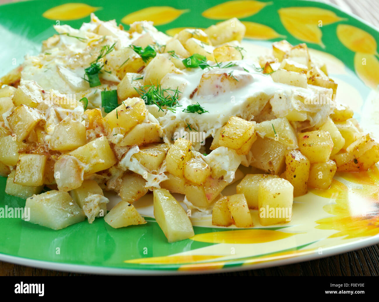 Patatesli yumurta - fried potatoes with eggs and spices.Turkish cuisine ...