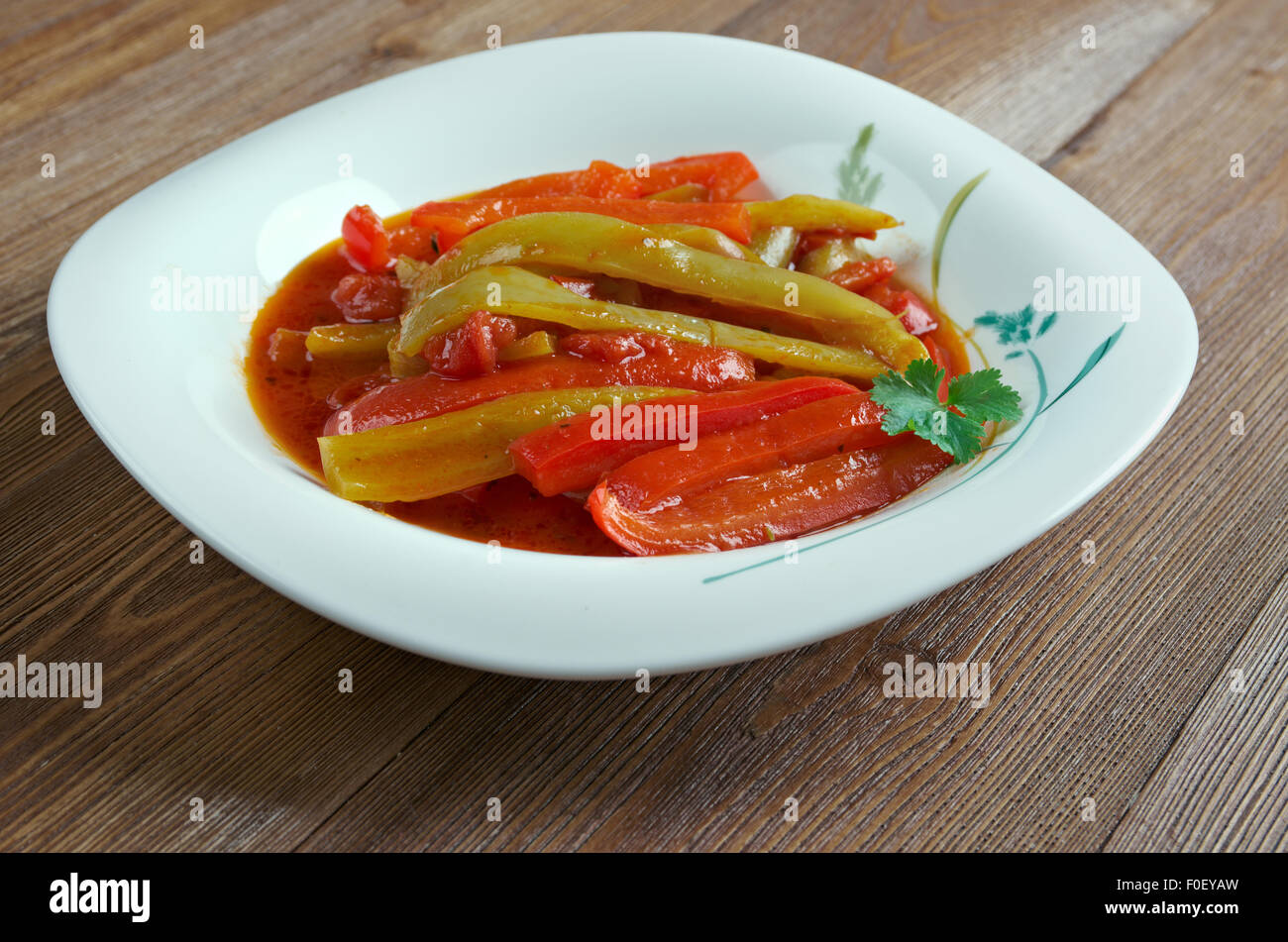 Piperade - typical Basque dish prepared with onion, green peppers, and ...