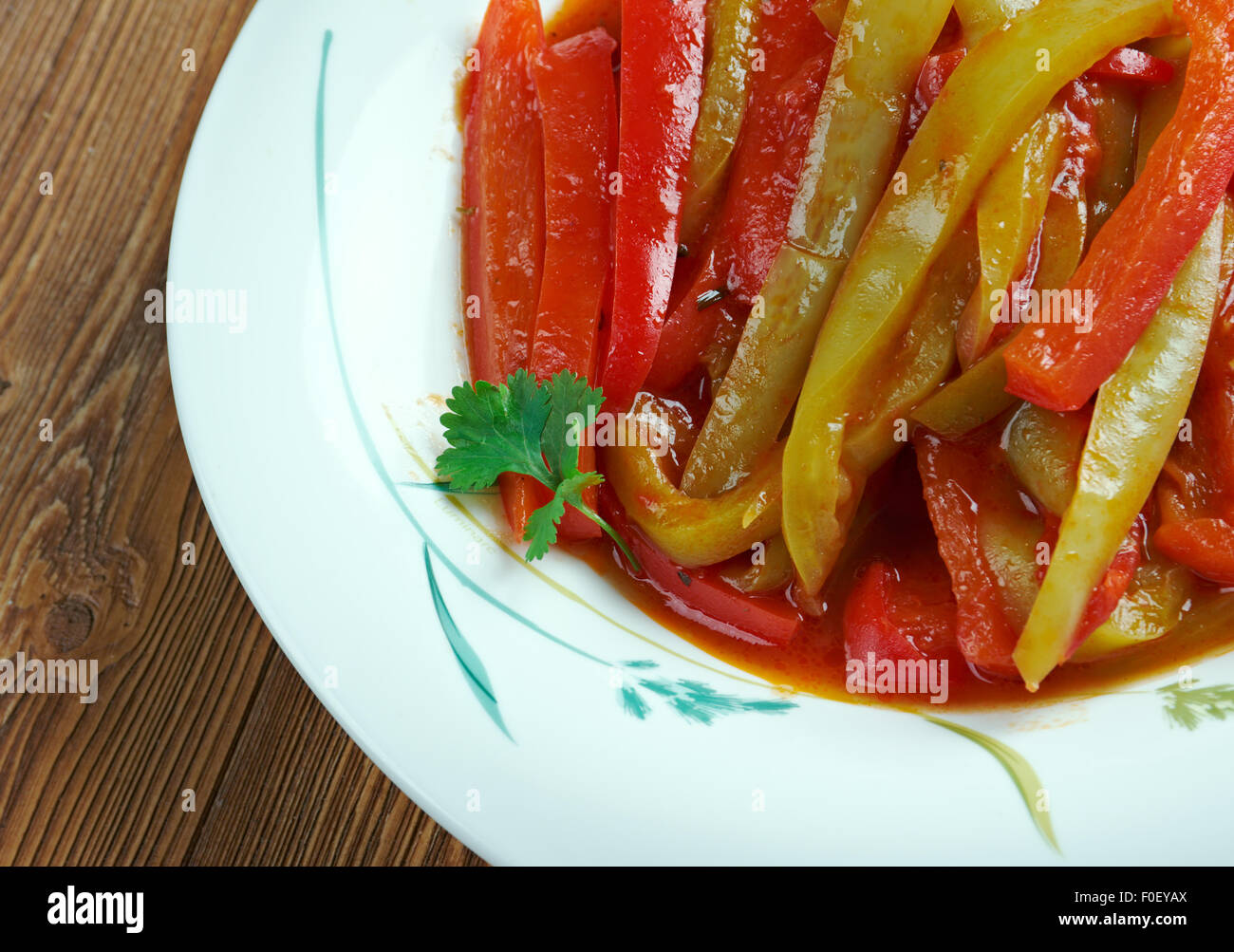 Piperade - typical Basque dish prepared with onion, green peppers, and ...