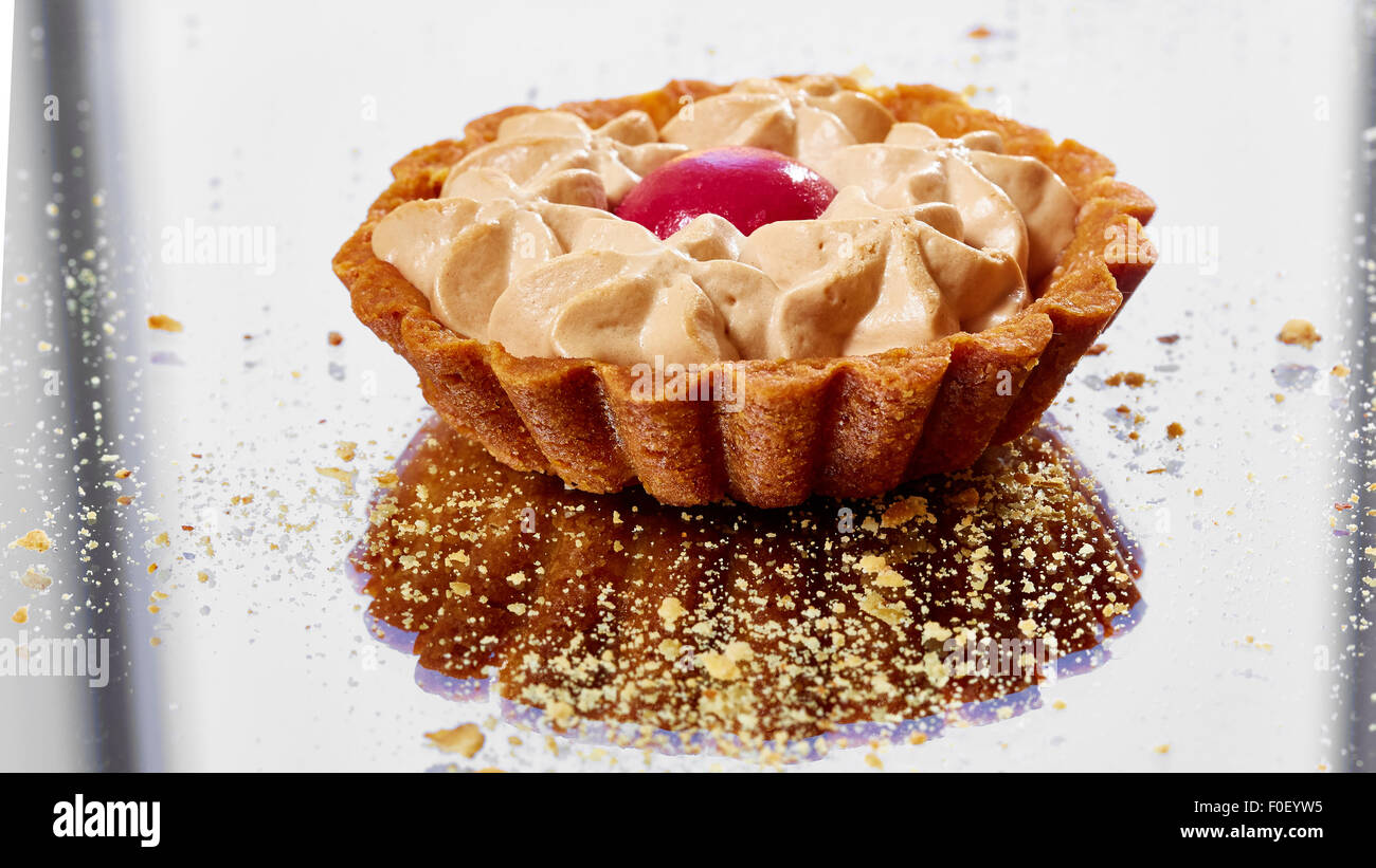Sweet tartlets filled with cream. With copy space Stock Photo - Alamy