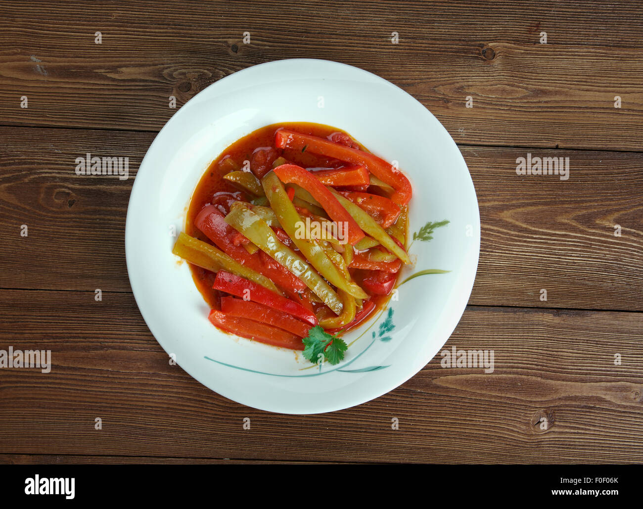 Piperade - typical Basque dish prepared with onion, green peppers, and ...
