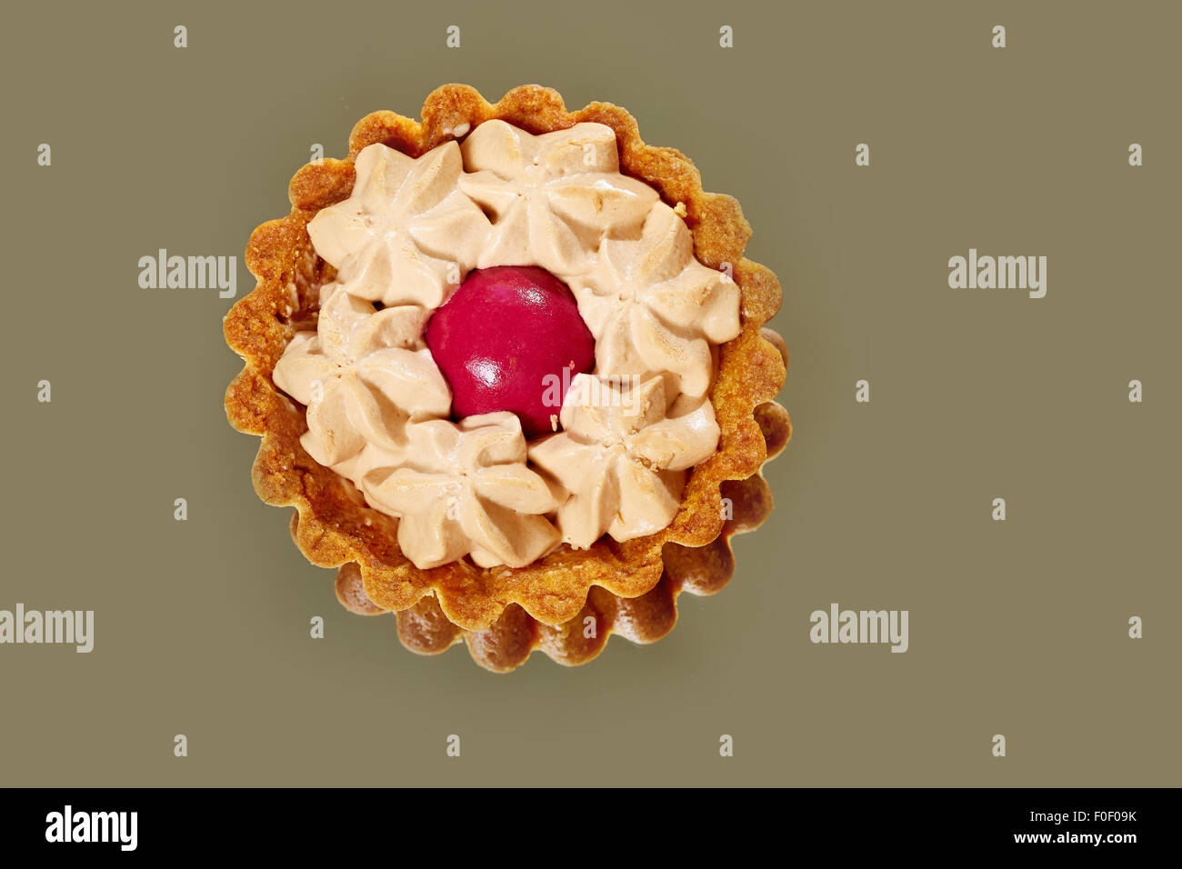 Sweet tartlets filled with cream. With copy space Stock Photo - Alamy