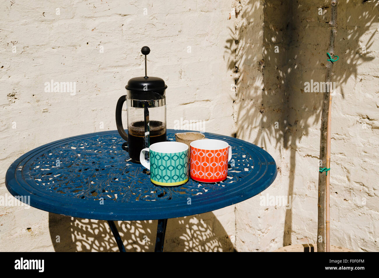Morning coffee in the garden Stock Photo - Alamy