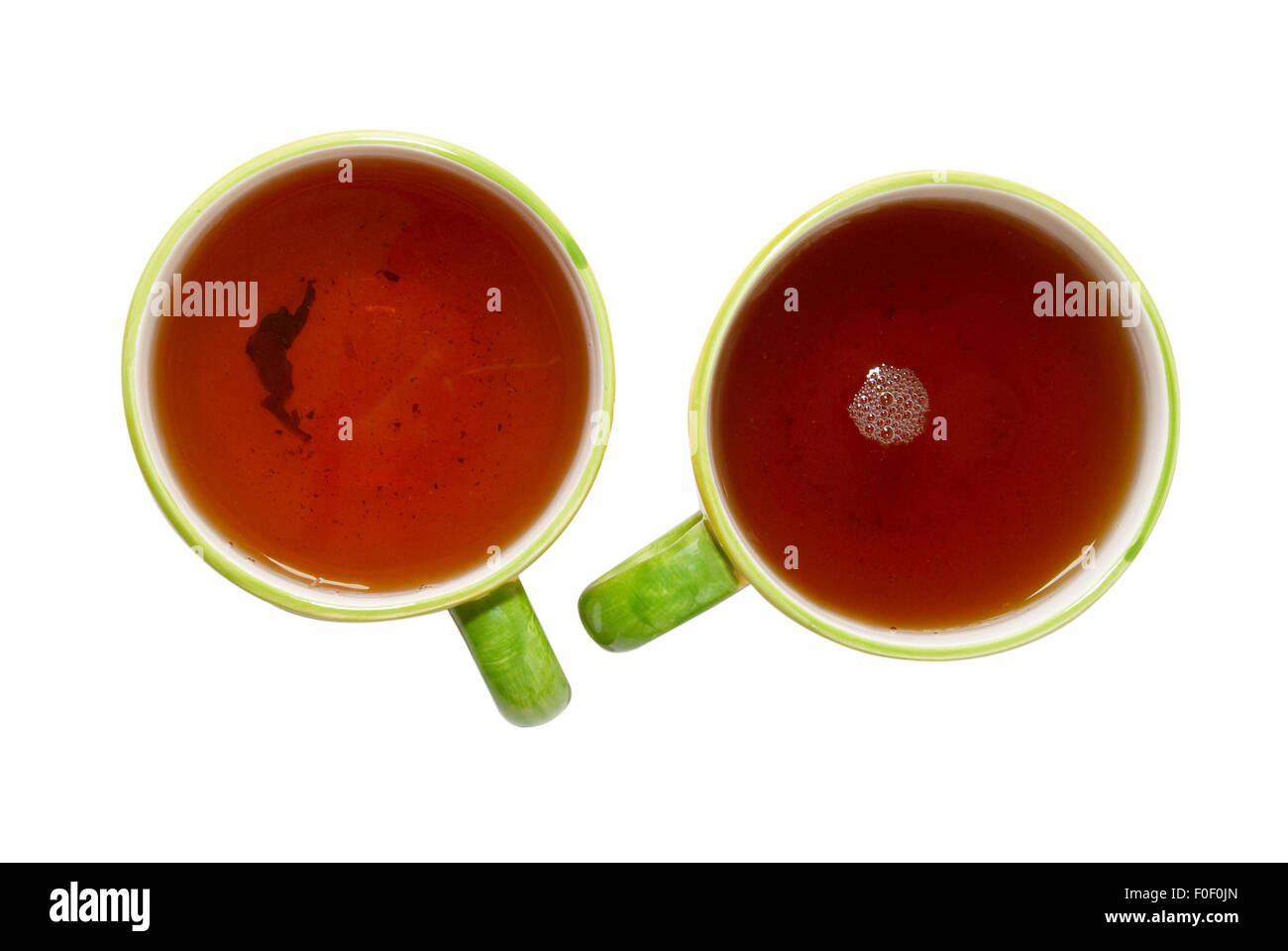 Two teacups with tea isolated on white Stock Photo - Alamy