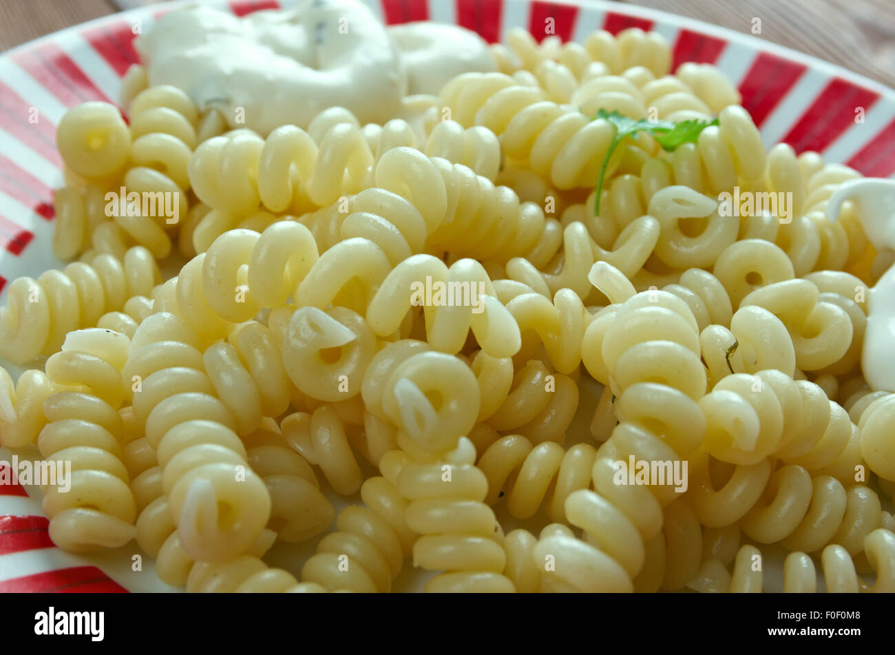 Fusilli - Italian pasta with cream sauce Stock Photo - Alamy