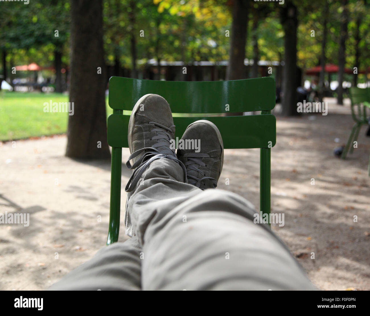 Feet up in a Parisian park, Paris, France, Europe Stock Photo - Alamy