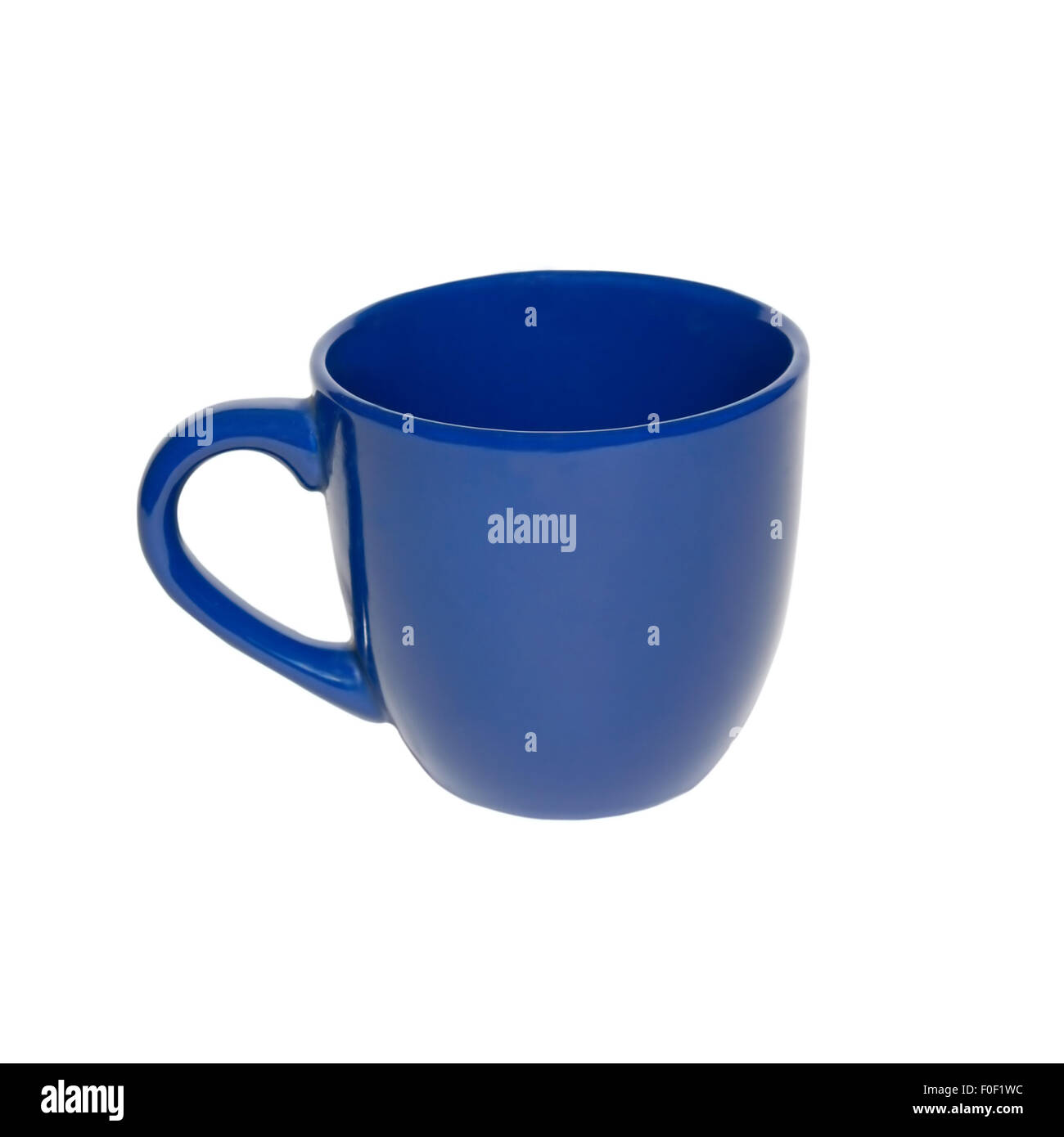 Deep blue cup isolated in white Stock Photo - Alamy
