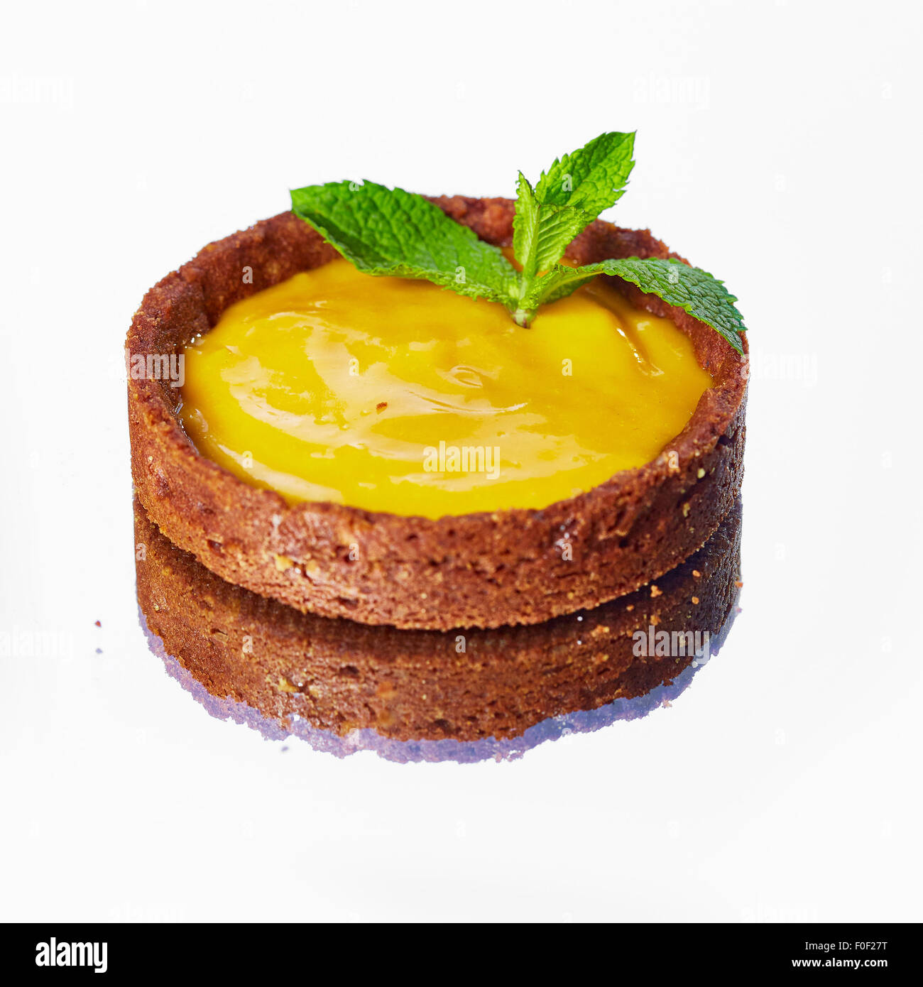 Sweet tartlets filled with cream. With copy space Stock Photo - Alamy