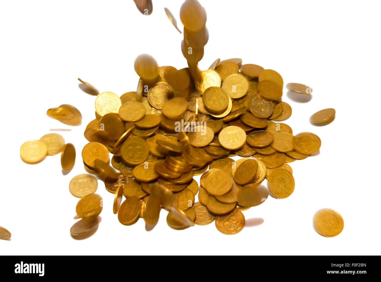 Rain of gold coins isolated on white Stock Photo - Alamy
