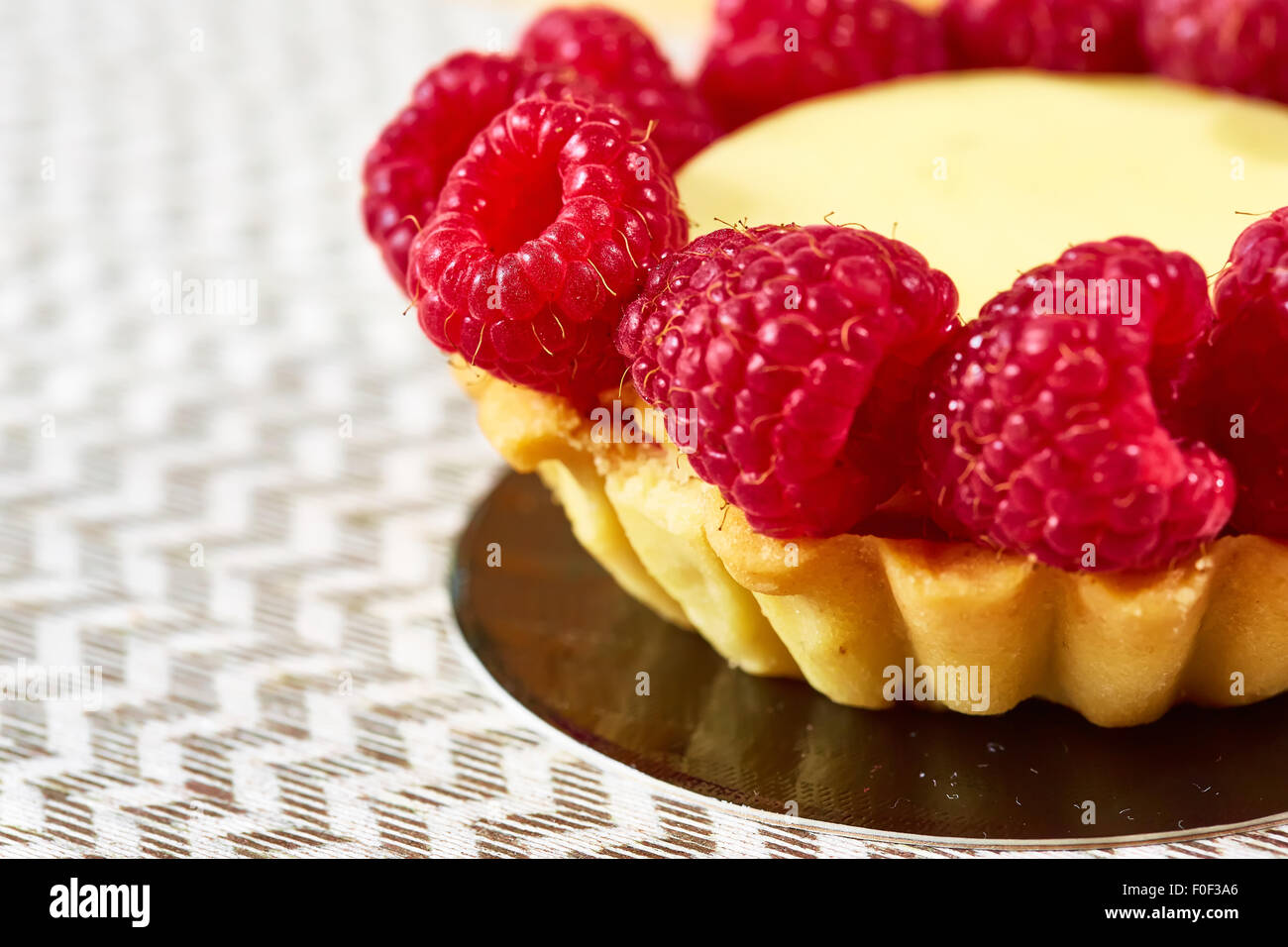 Home made tartlets with raspberries. With copy space Stock Photo - Alamy