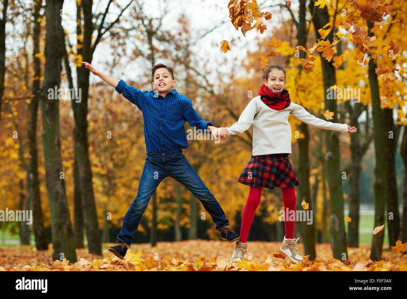 Children Jump Leaves High Resolution Stock Photography and Images - Alamy