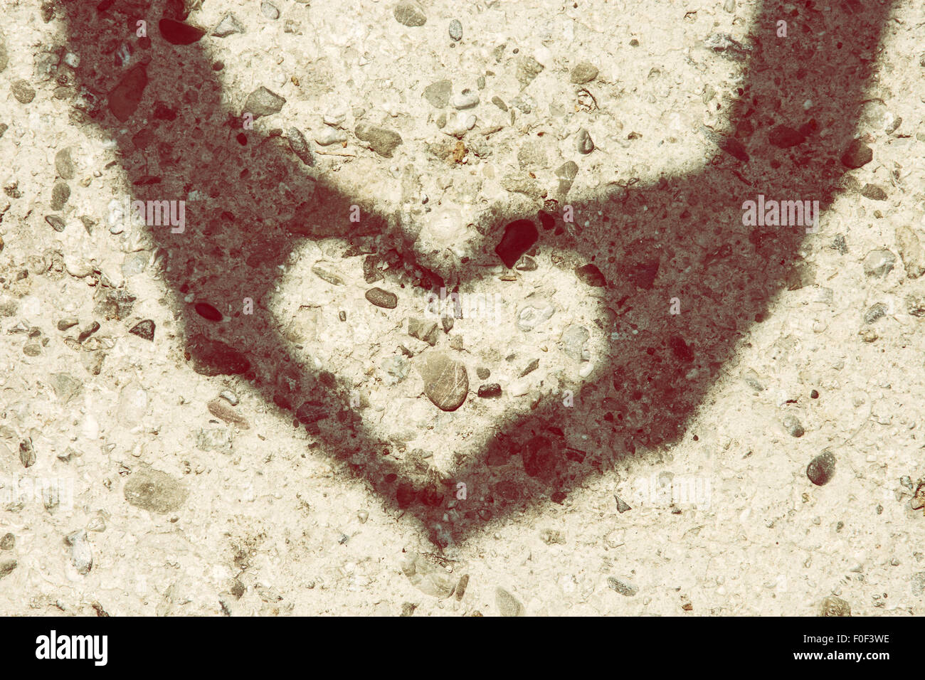 Lovely woman is doing heart shadow by hands. Valentine's day Stock ...