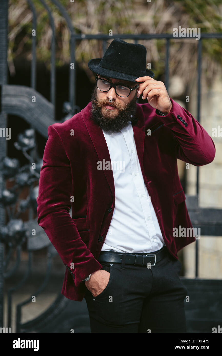 rich man with a beard, thinking about business Stock Photo - Alamy