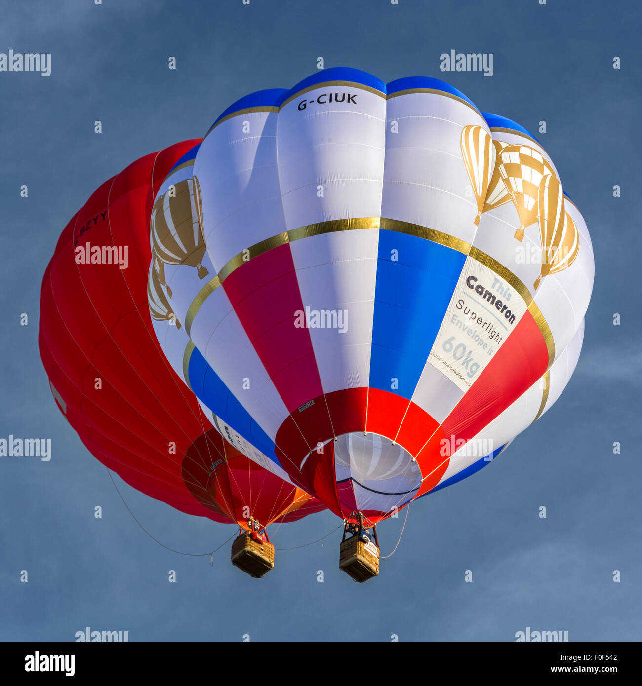 Close encounter for this pair of balloons lifting off at the 37th ...