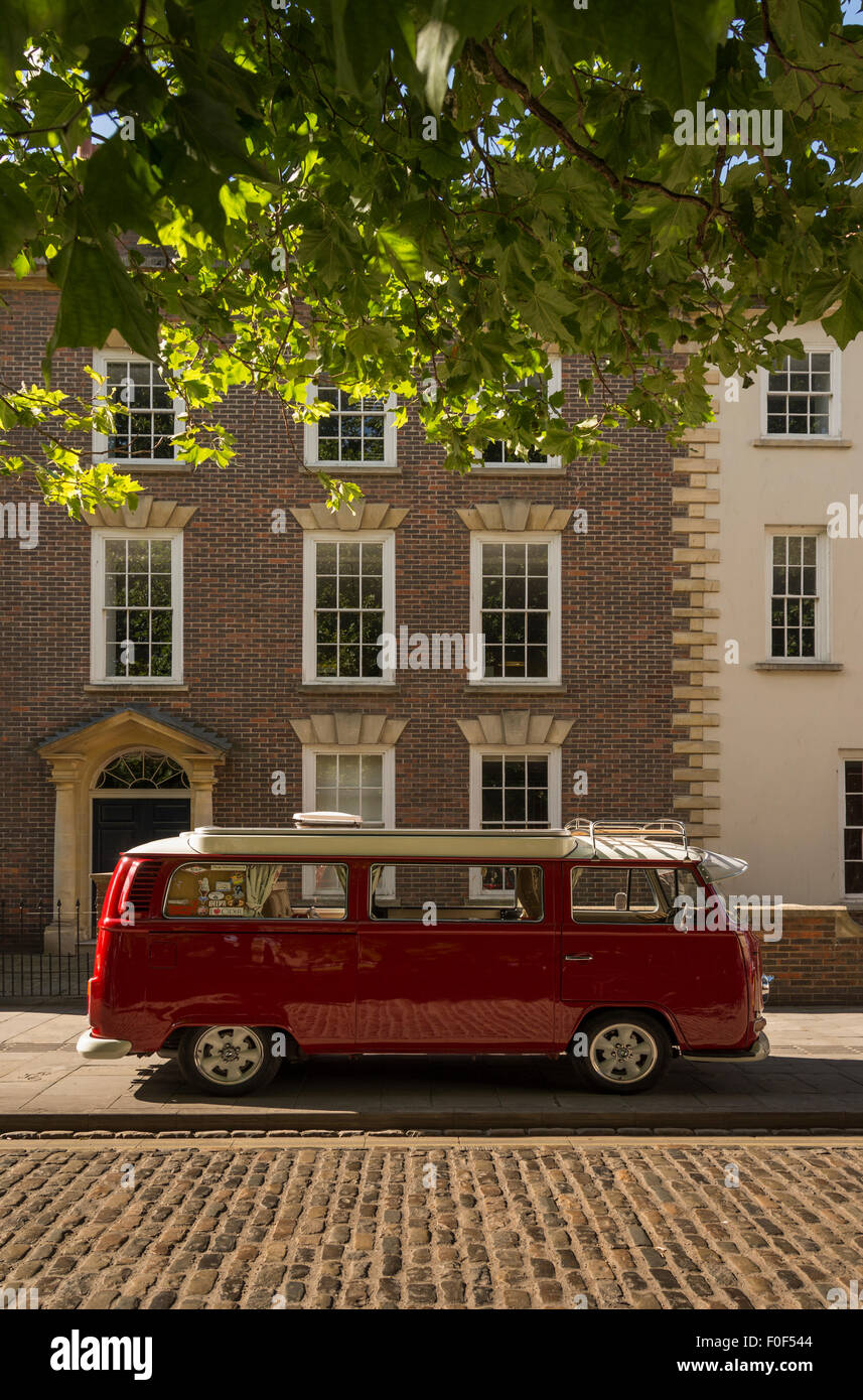 Shiny red VW Campervan parked up in Queen's Square, Bristol. The ...