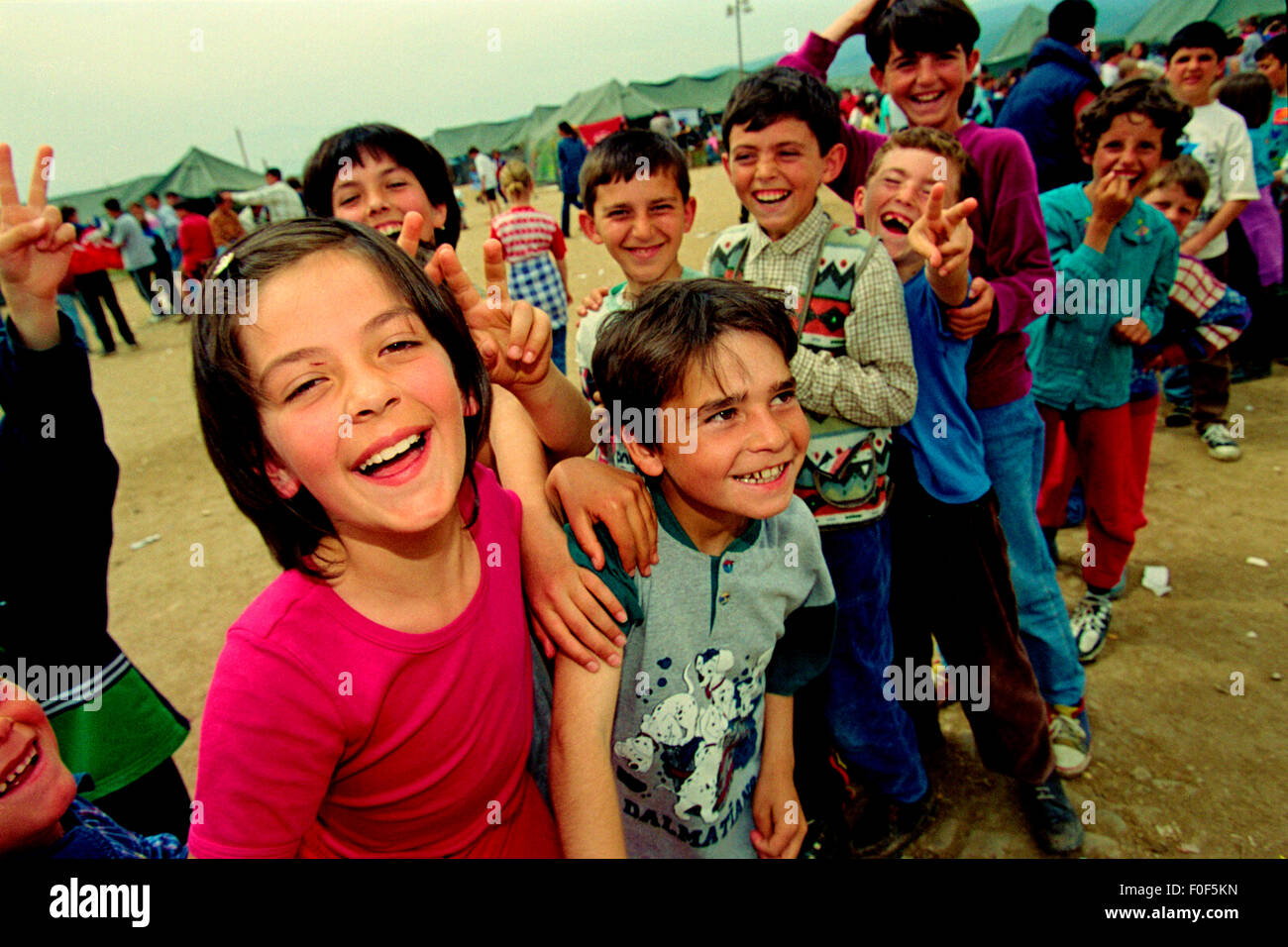 Kosovan refugees at camp Strankovic Macedonia 1999 .. kids happy and ...
