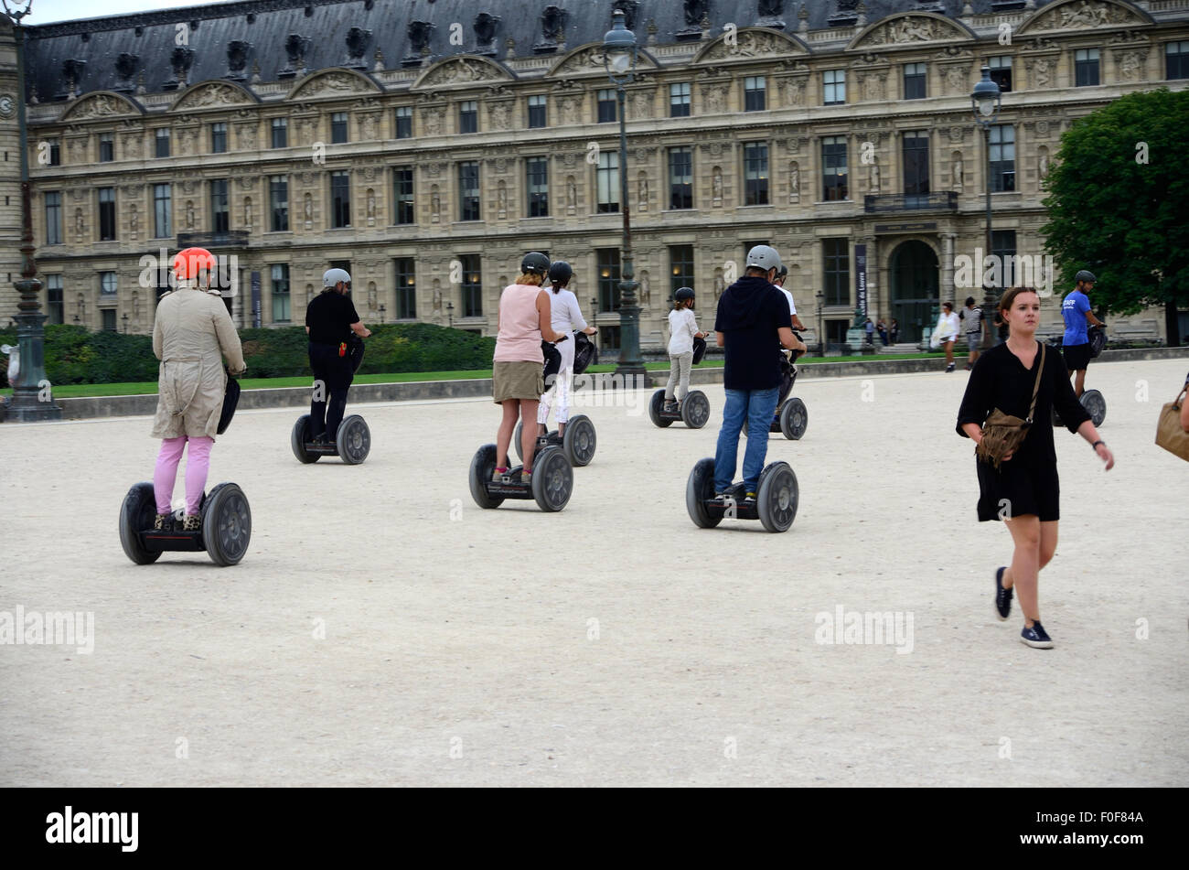 A tour party explores Paris using Segways Stock Photo - Alamy