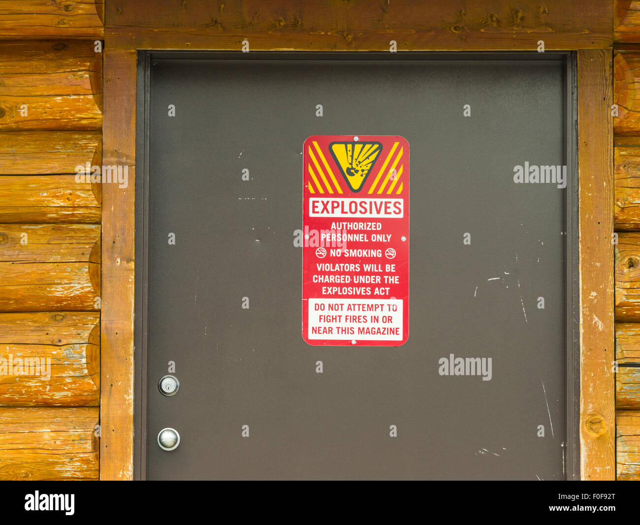 Warning sign on door of avalanche prevention explosives magazine near ...