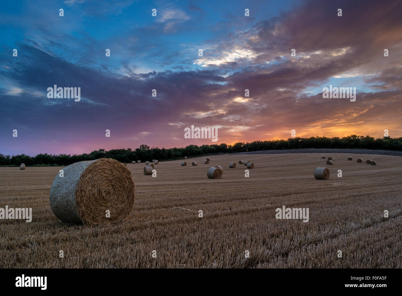 Farm field hay bales dusk hi-res stock photography and images - Alamy