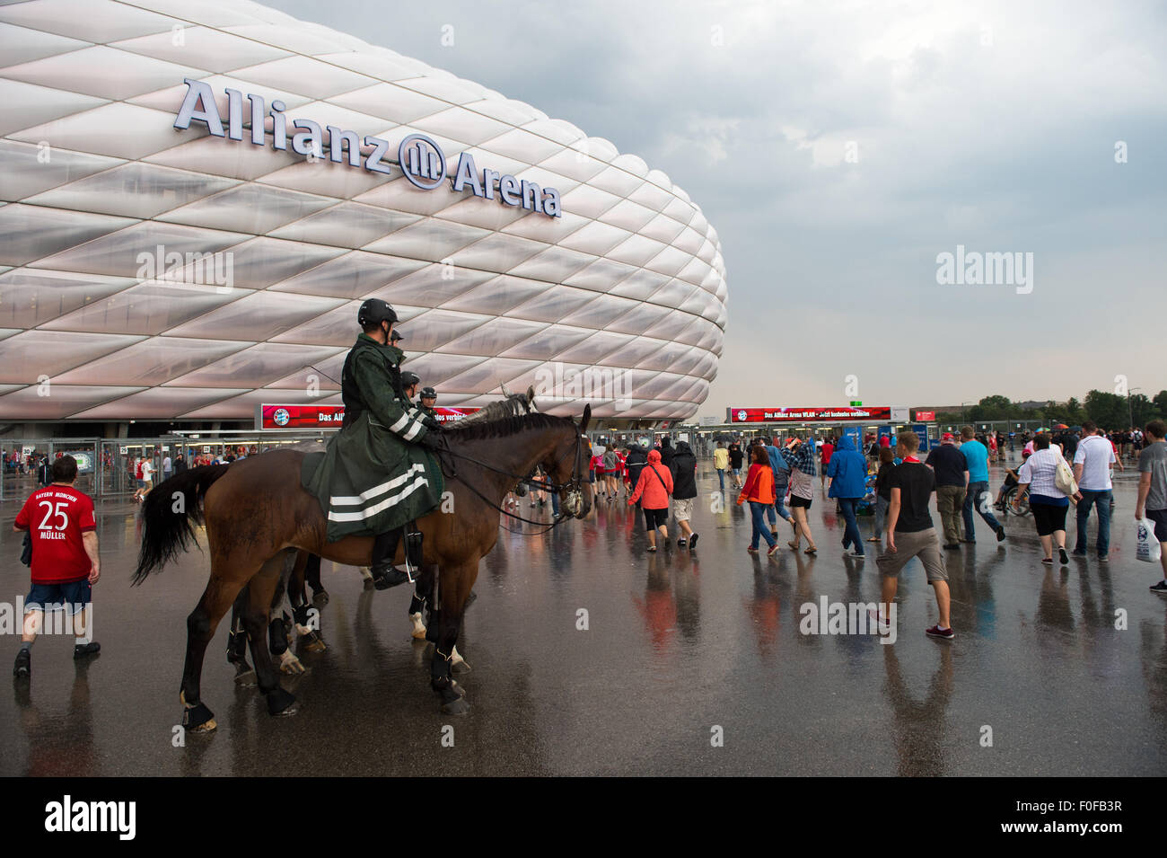 Mounted police watch fans arrive before the German Bundesliga soccer ...