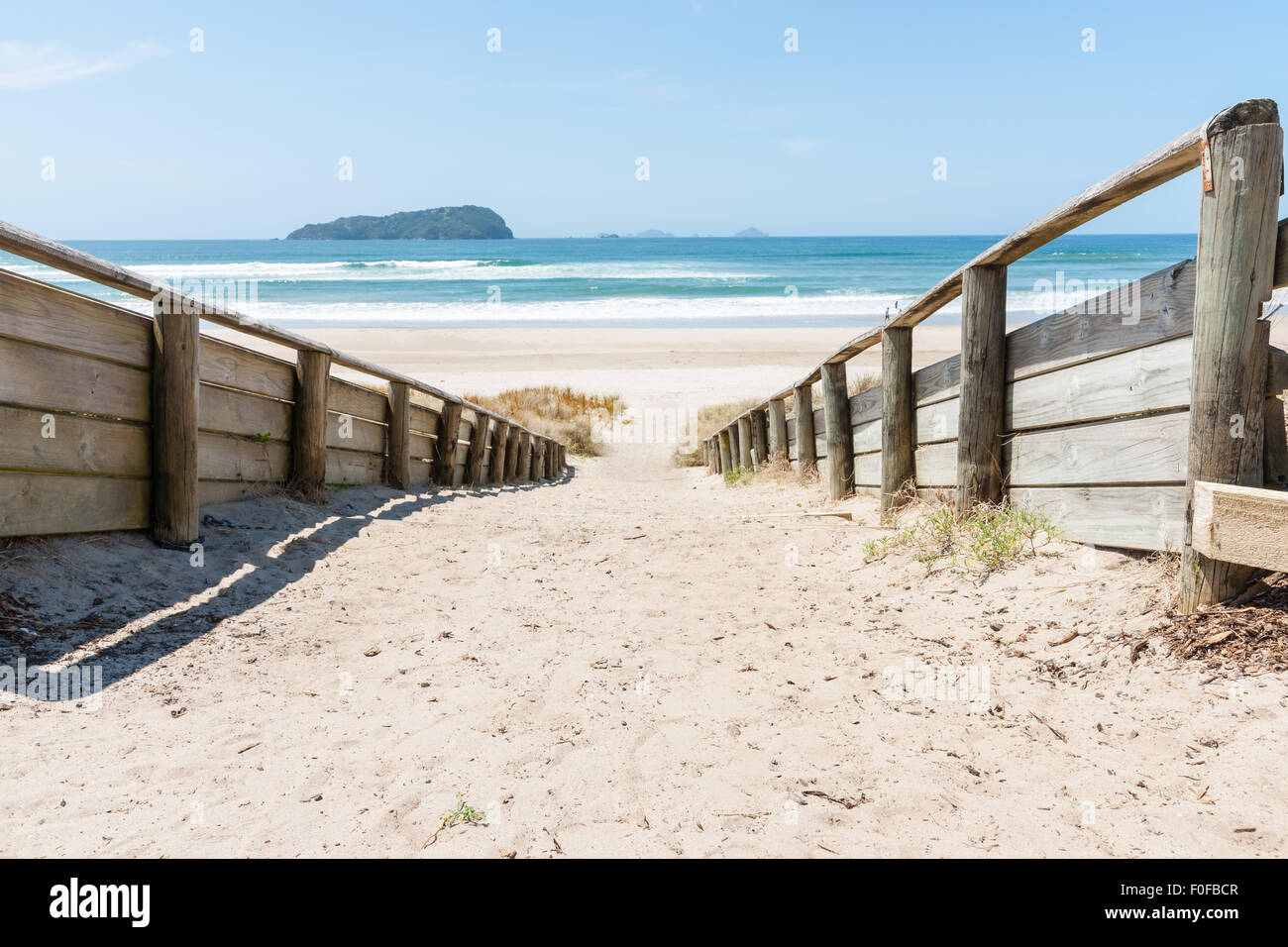 Sand path leading to Pauanui ocean beach. New Zealand Stock Photo - Alamy
